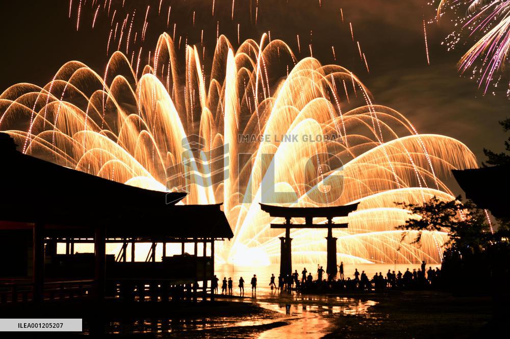 Fireworks display at Miyajima in Hiroshima Pref. | Imagelinkglobal ILG ...